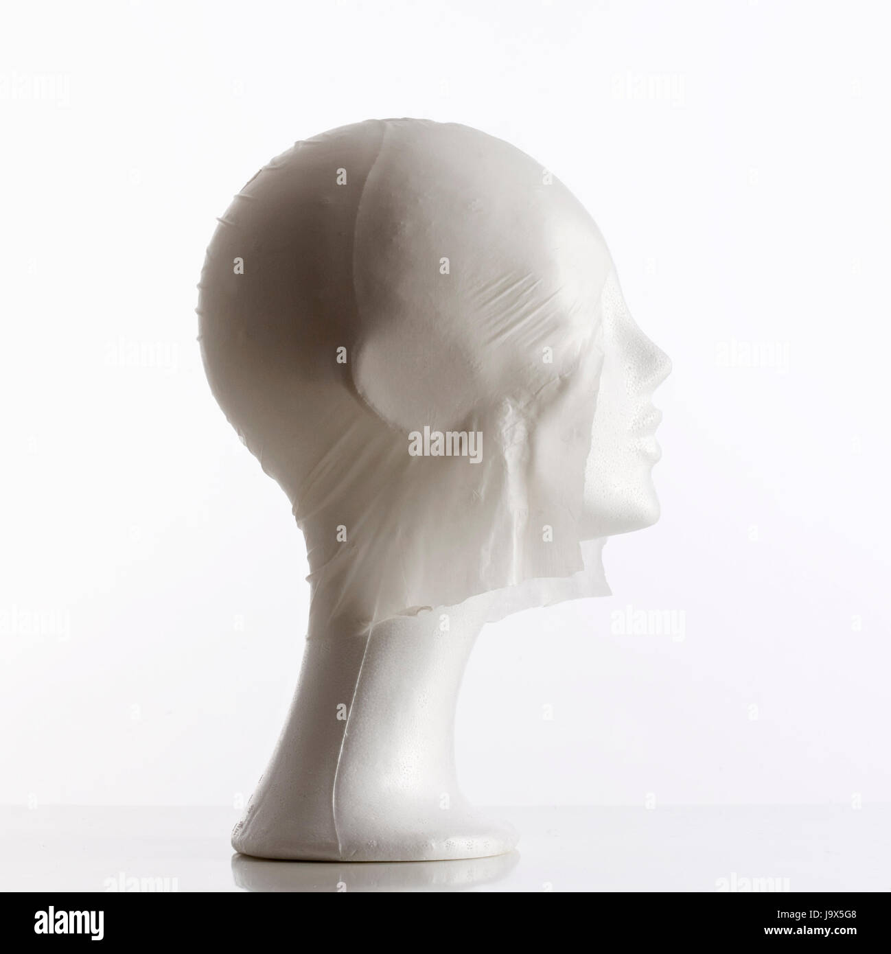 Mannequin Scalp Covered by Plastic As Bald Head Stock Photo - Alamy