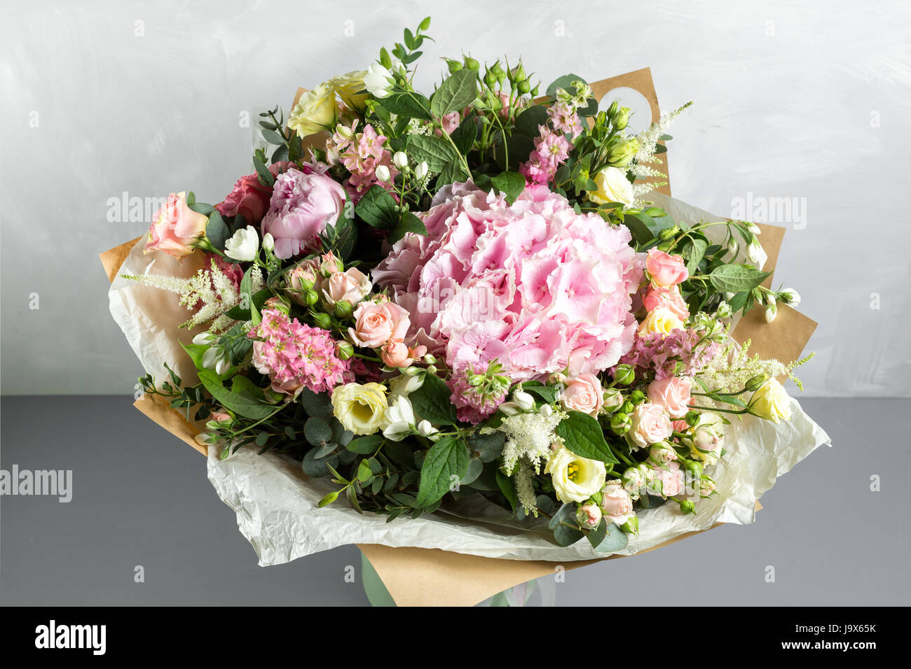 Still life with a bouquet of flowers. the florist put together a ...