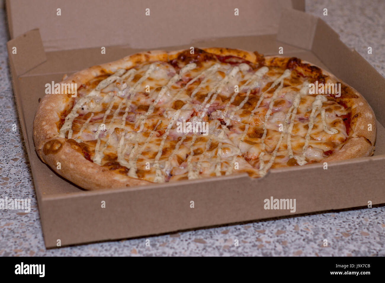 A delicious beautiful pizza is in the box Stock Photo - Alamy