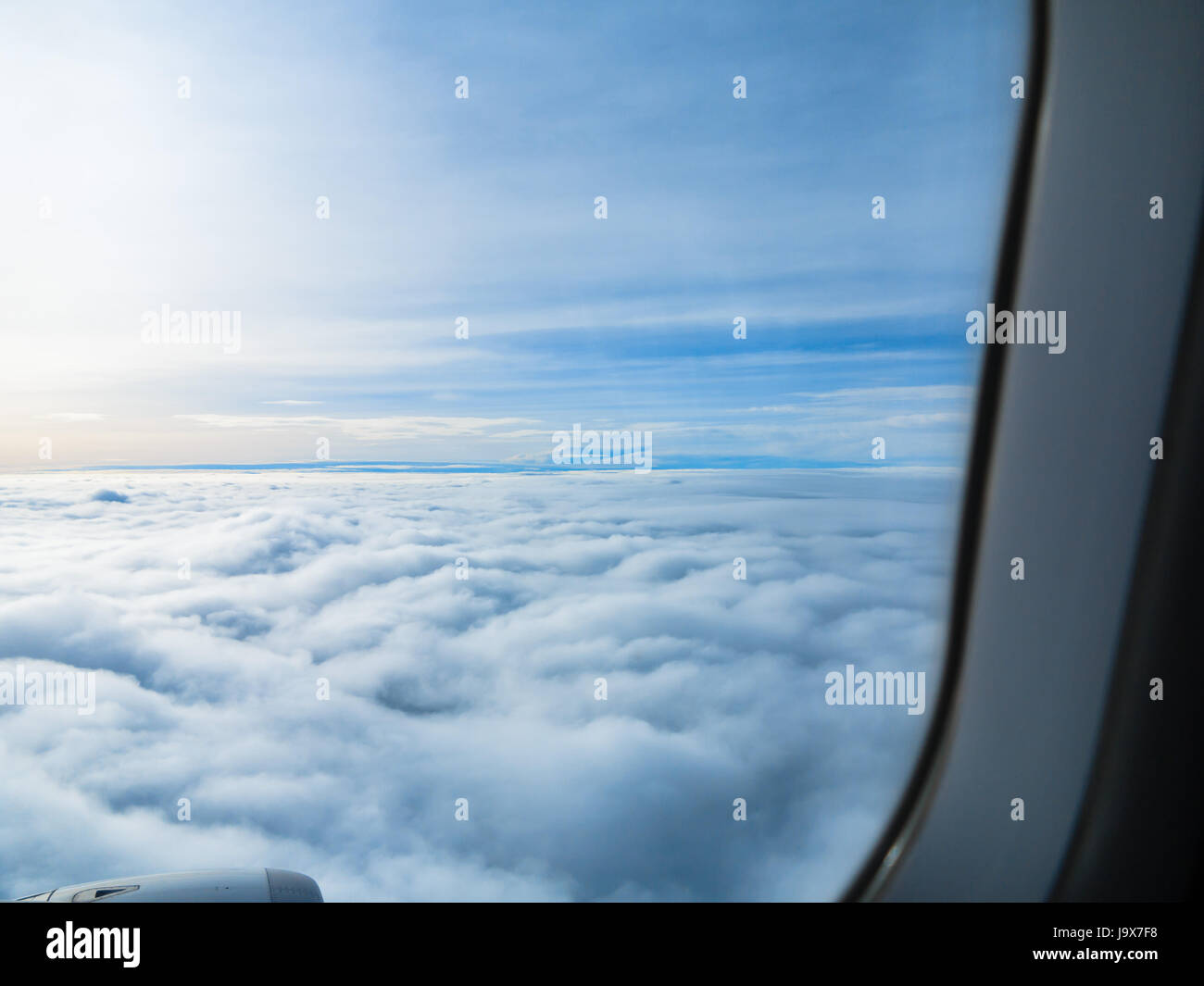 Clouds view from air plane with horizon Stock Photo - Alamy