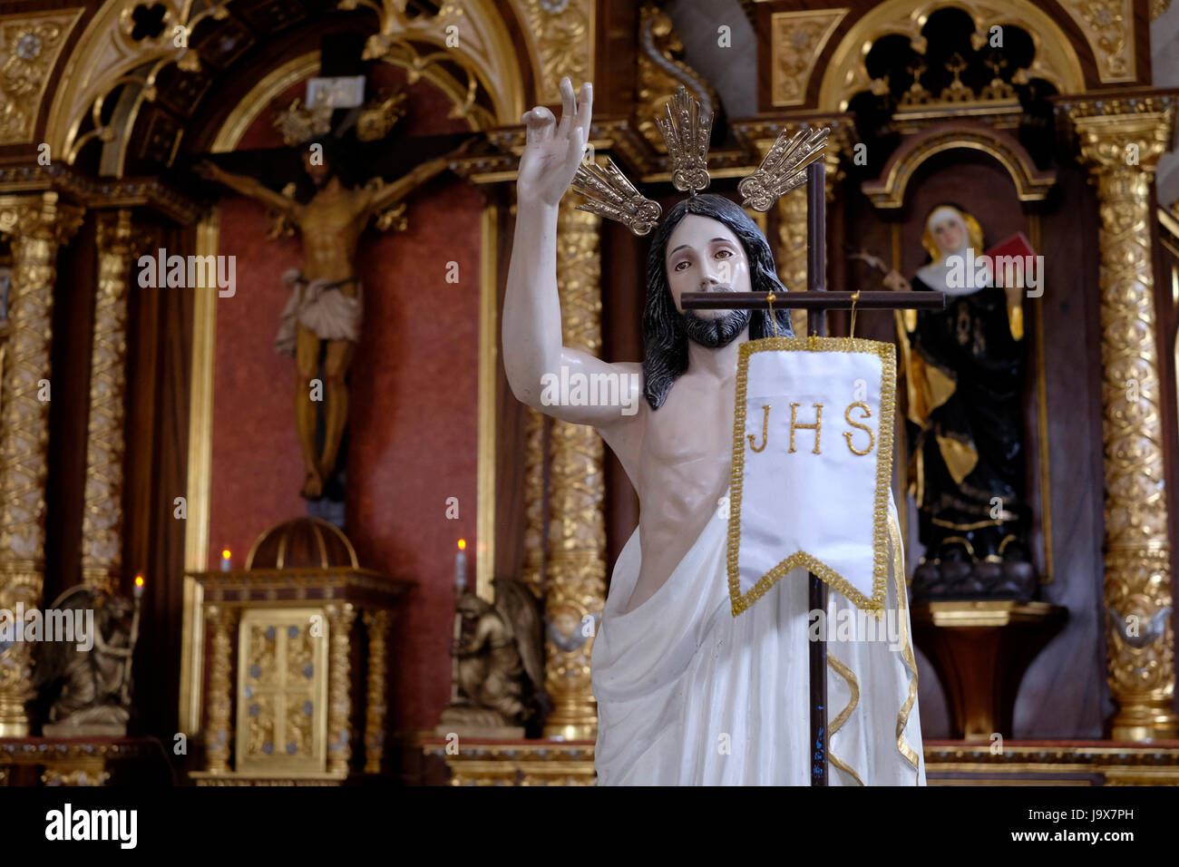 Statue of Jesus with the monogram JHS ( traditional Christogram symbol ...