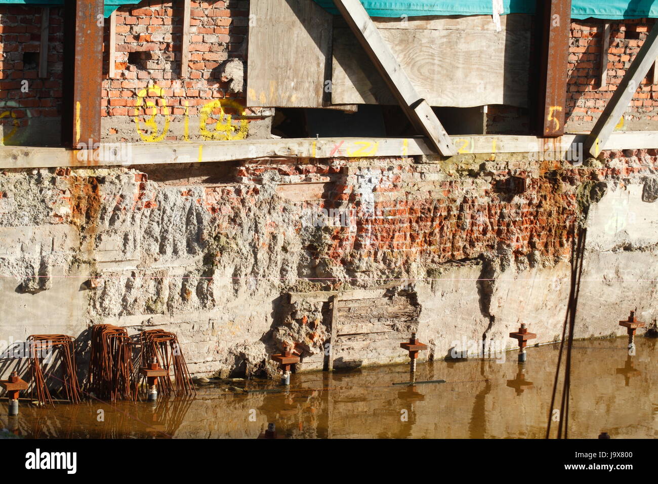 Excavation pit, full with water Stock Photo - Alamy