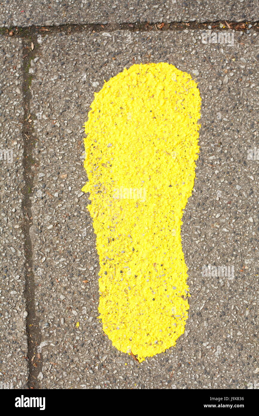 Yellow Street Mark Footprints Stock Photo - Alamy