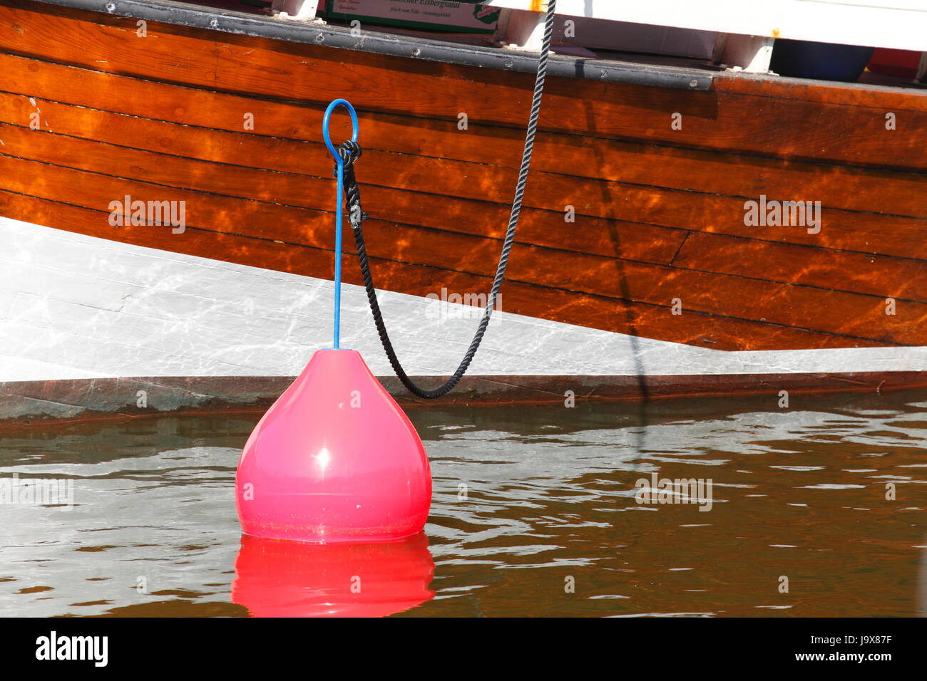 red swimming buoy Stock Photo - Alamy