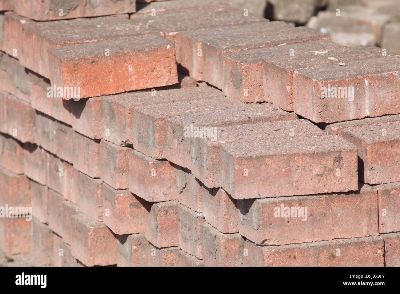 red stacked up paving-stones Stock Photo - Alamy