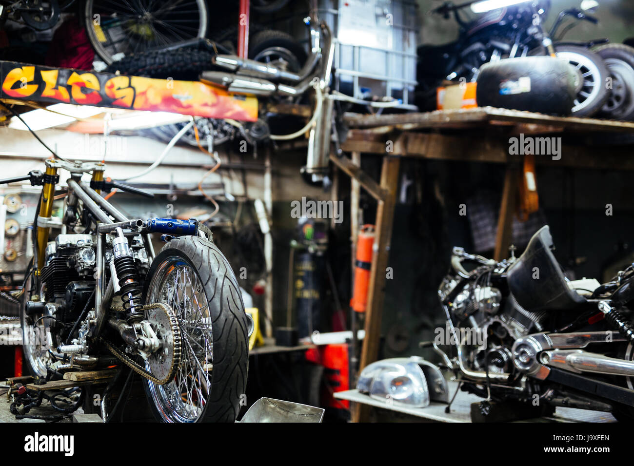 Background image of disassembled motorcycle ready for repairing in ...