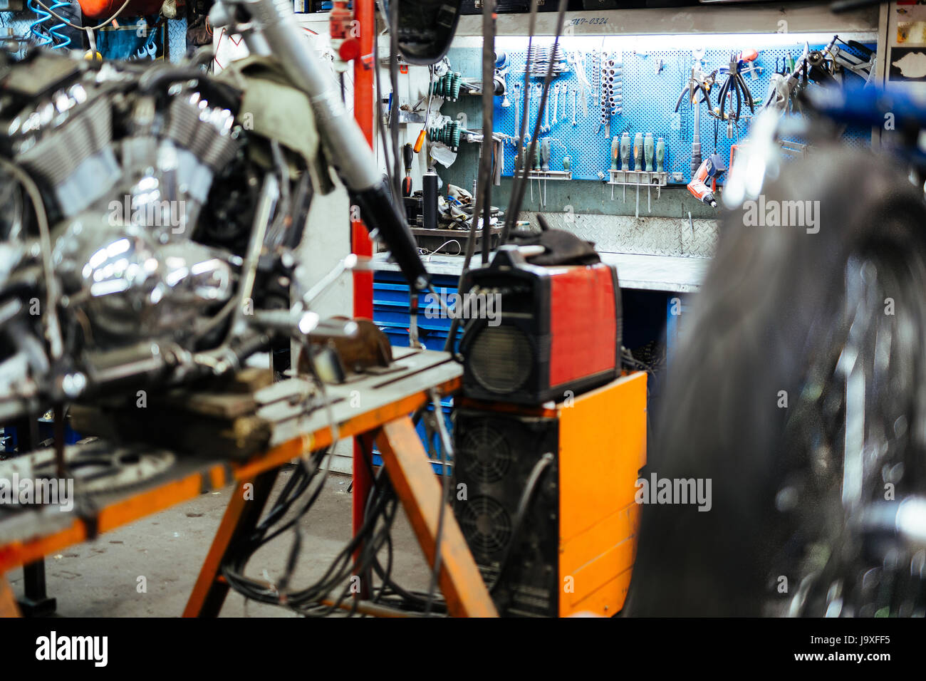 Background image of different tools and equipment in mechanics garage ...