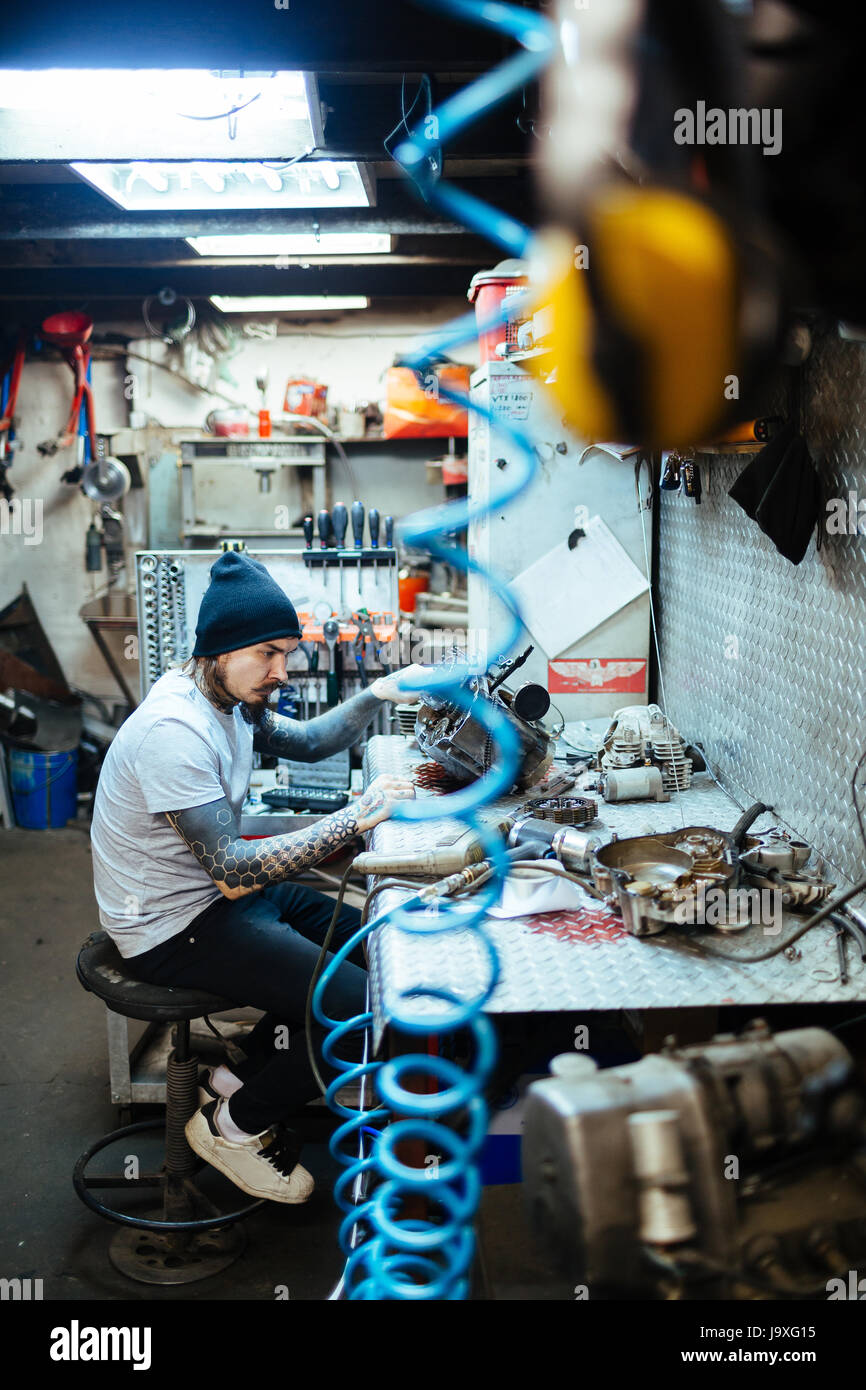 Car service brutal mechanic man hi-res stock photography and images - Alamy