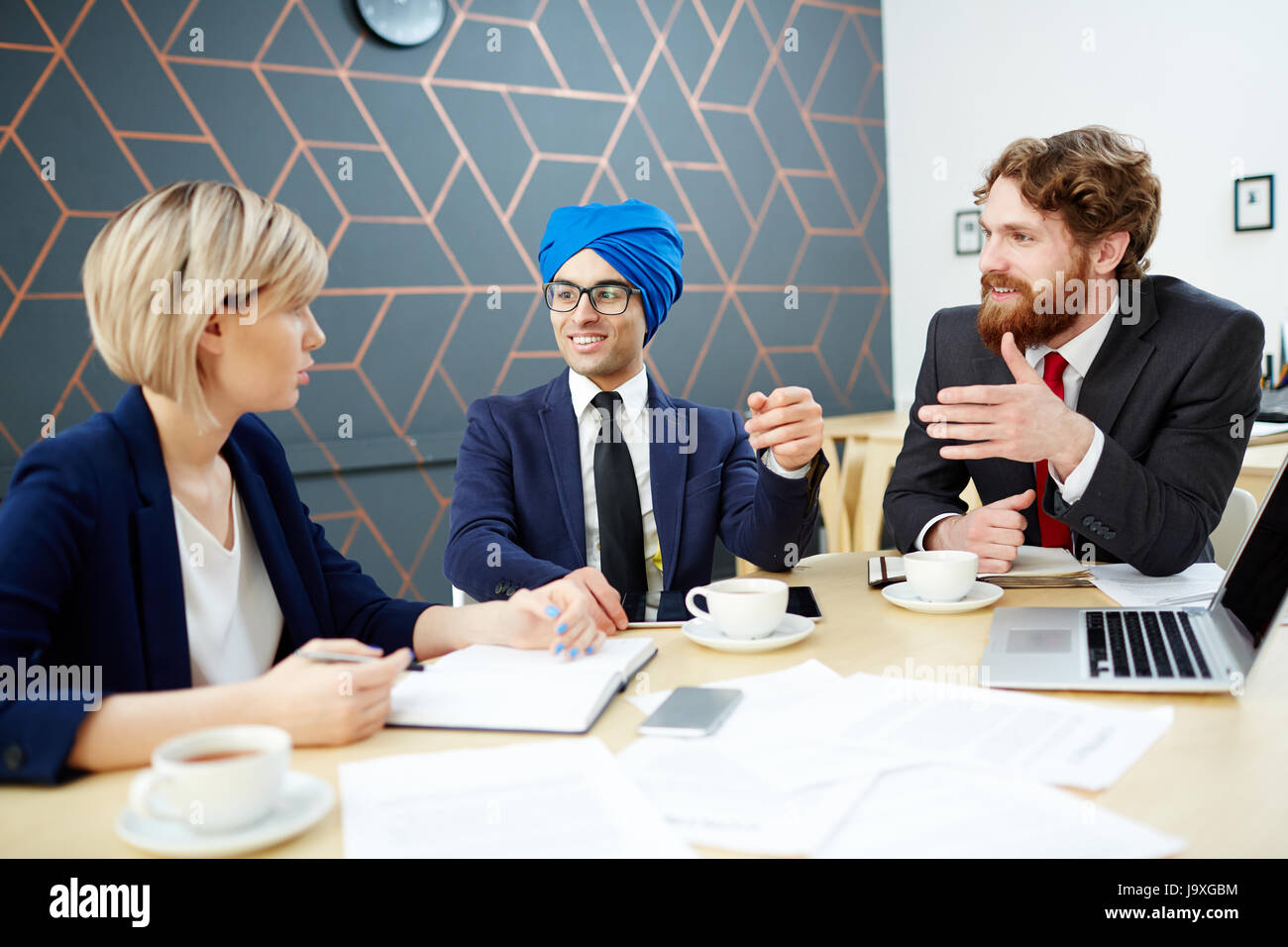 Talk show with reporters and Arabian man in tv studio Stock Photo - Alamy