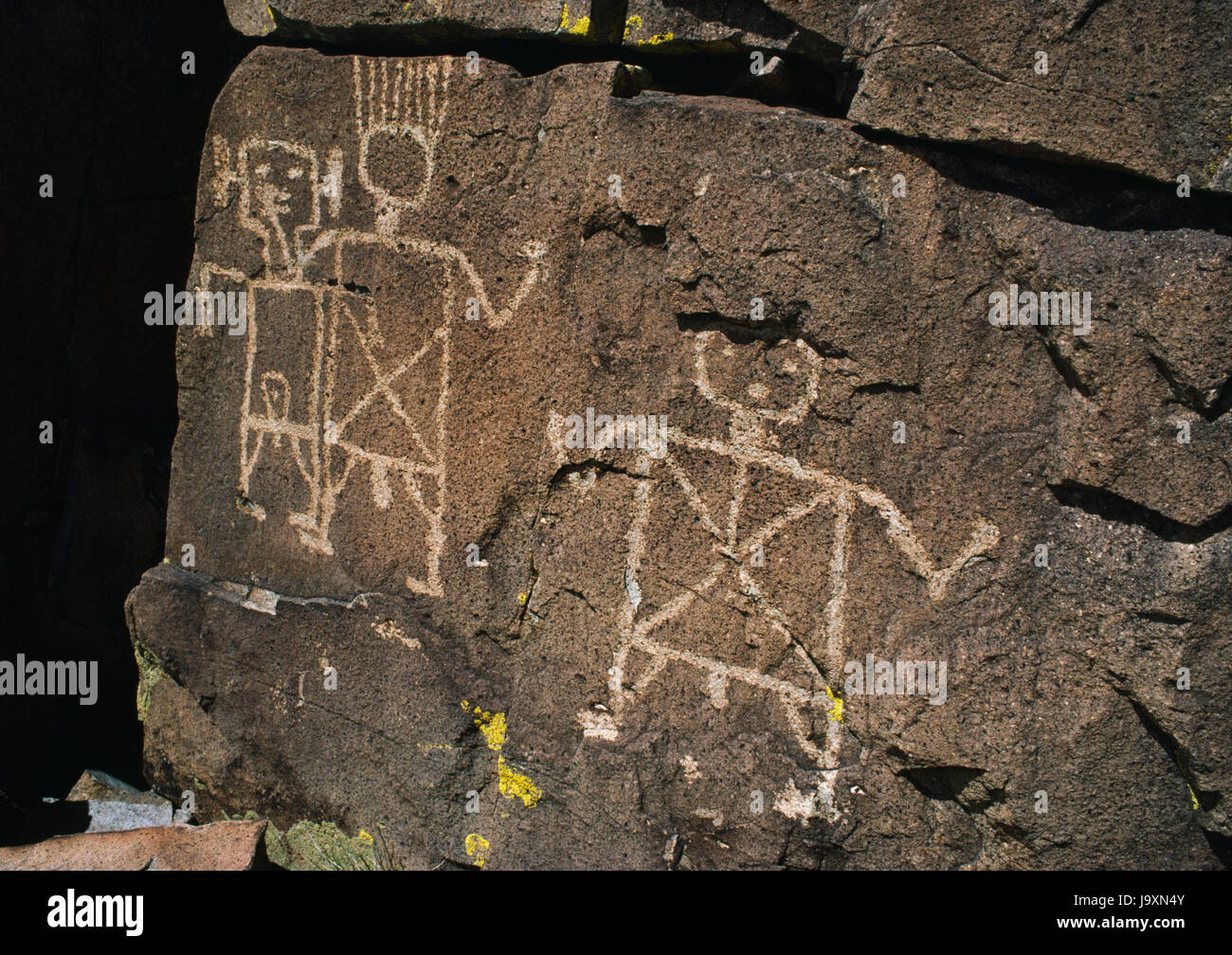 Pueblo ceremonial figures (kachinas) carved on Comanche Gap volcanic ...