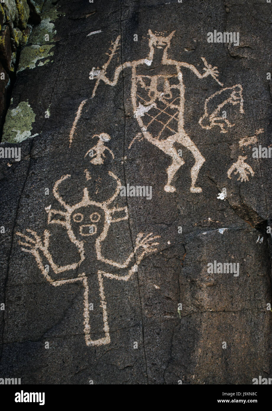 Kokopelli (fluteplayer) and other Pueblo ceremonial figures carved on ...