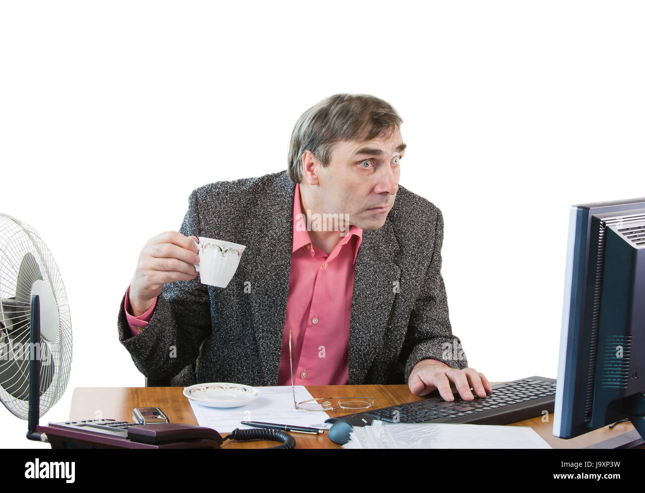a business man in an office works at the computer Stock Photo - Alamy