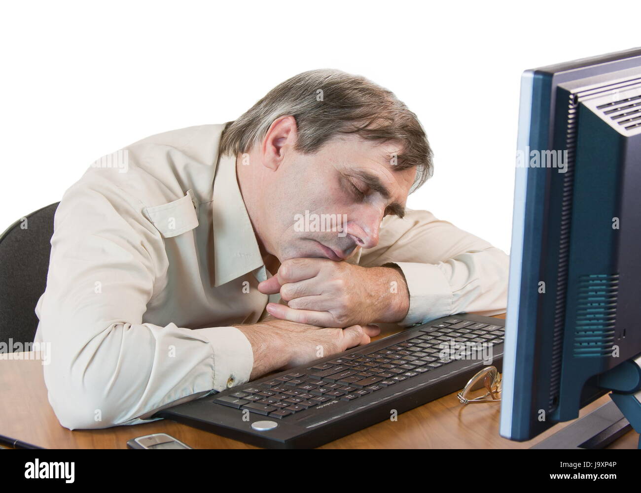 a business man in an office works at the computer Stock Photo - Alamy