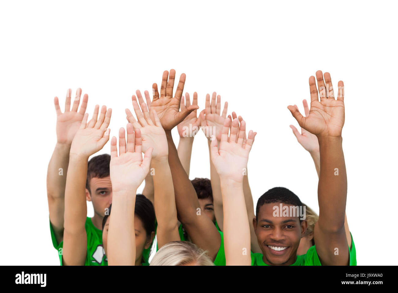 Smiling group of people raising arms on white background Stock Photo ...