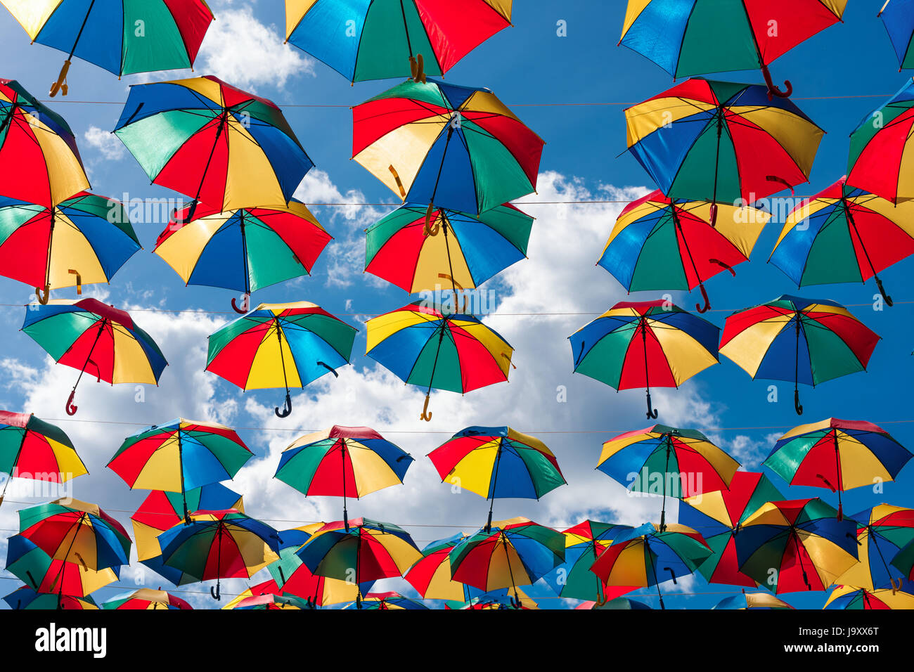 Colorful umbrellas background. Coloruful umbrellas urban street ...