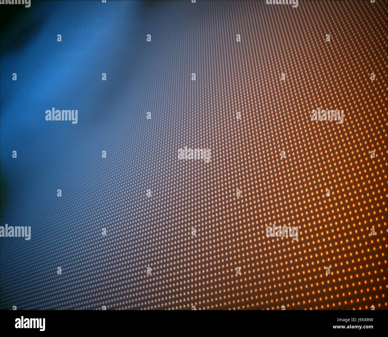 Background of multiple orange dots fading to blue Stock Photo - Alamy