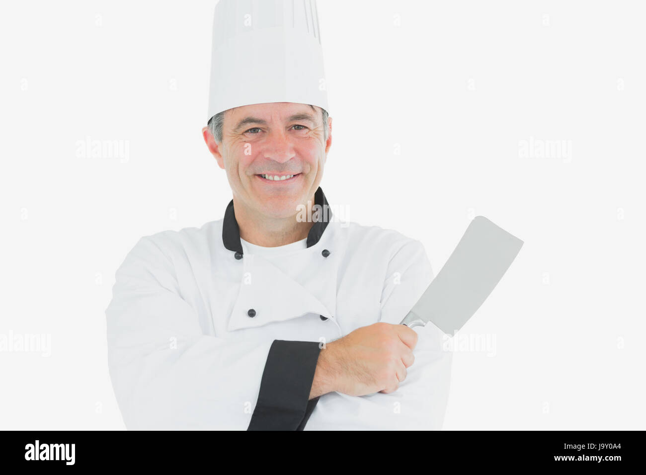 Portrait of happy male chef holding kitchen knife over white background ...