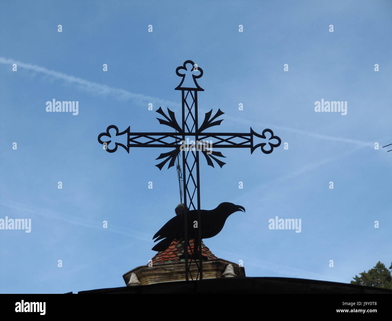 cross and raven,vieux outils museum in luceram Stock Photo - Alamy