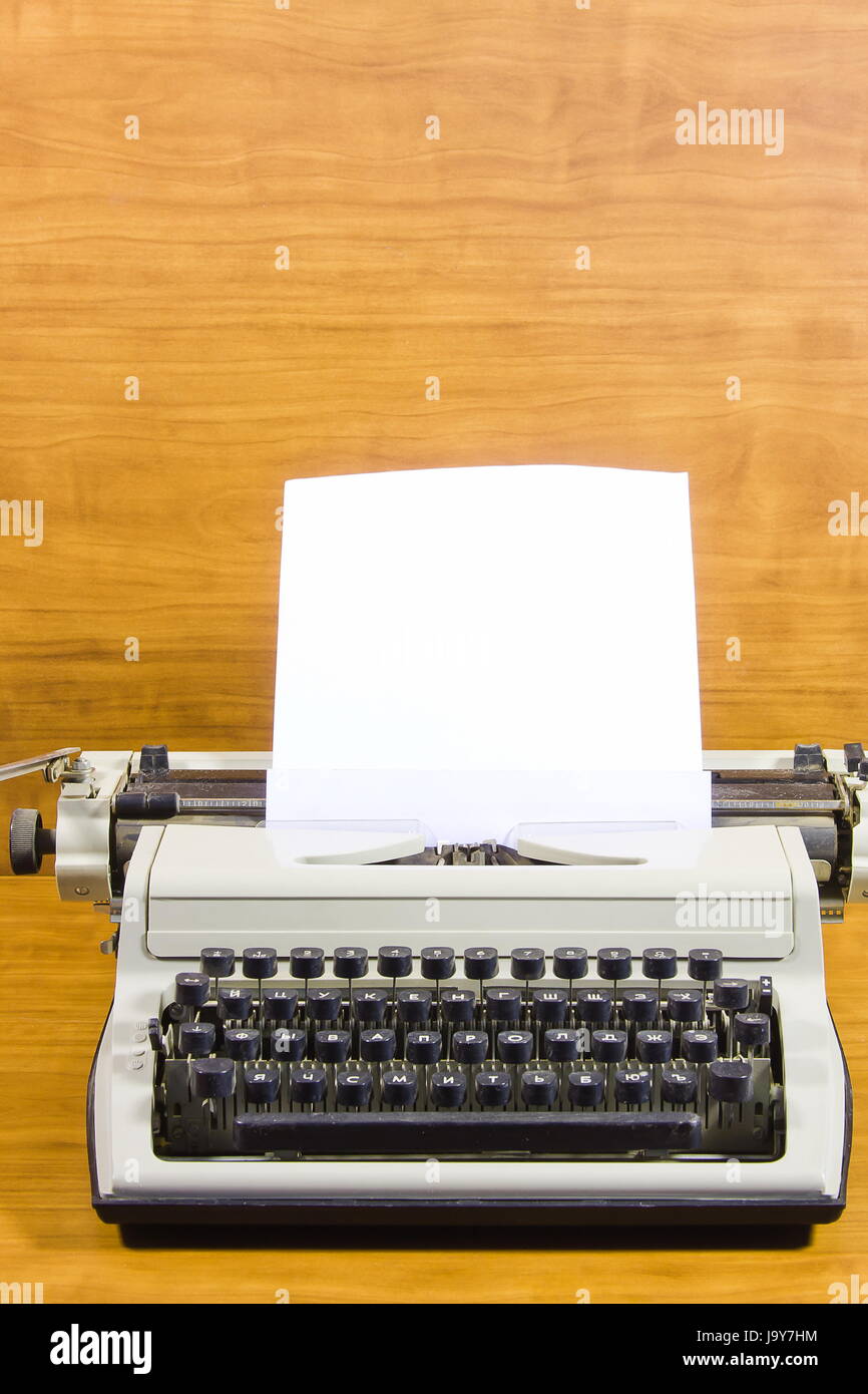 old typewriter and clean sheet of paper Stock Photo - Alamy