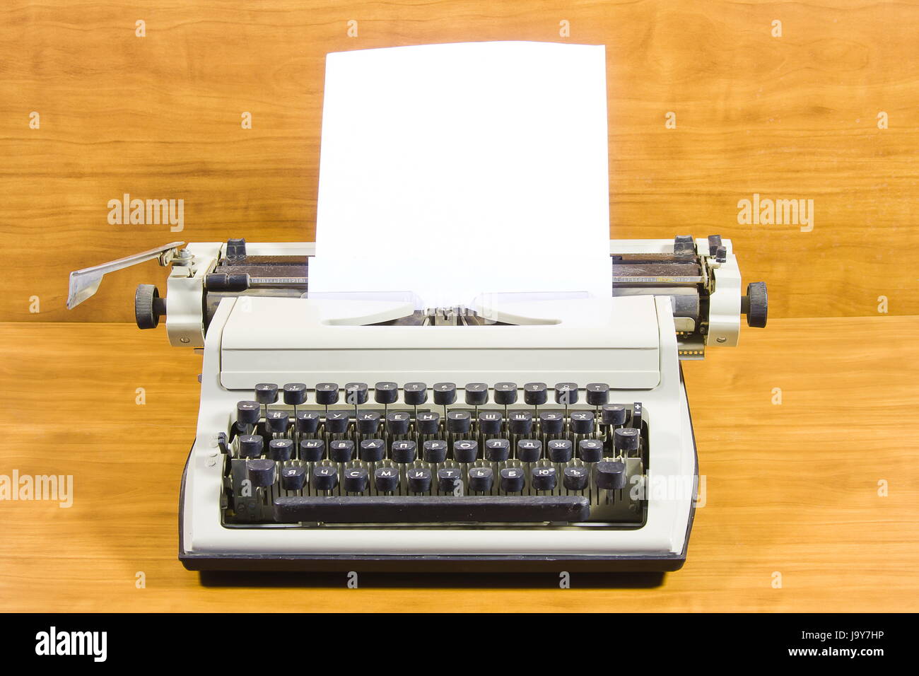 old typewriter and clean sheet of paper Stock Photo - Alamy