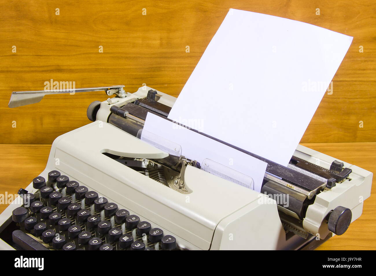 old typewriter and clean sheet of paper Stock Photo - Alamy