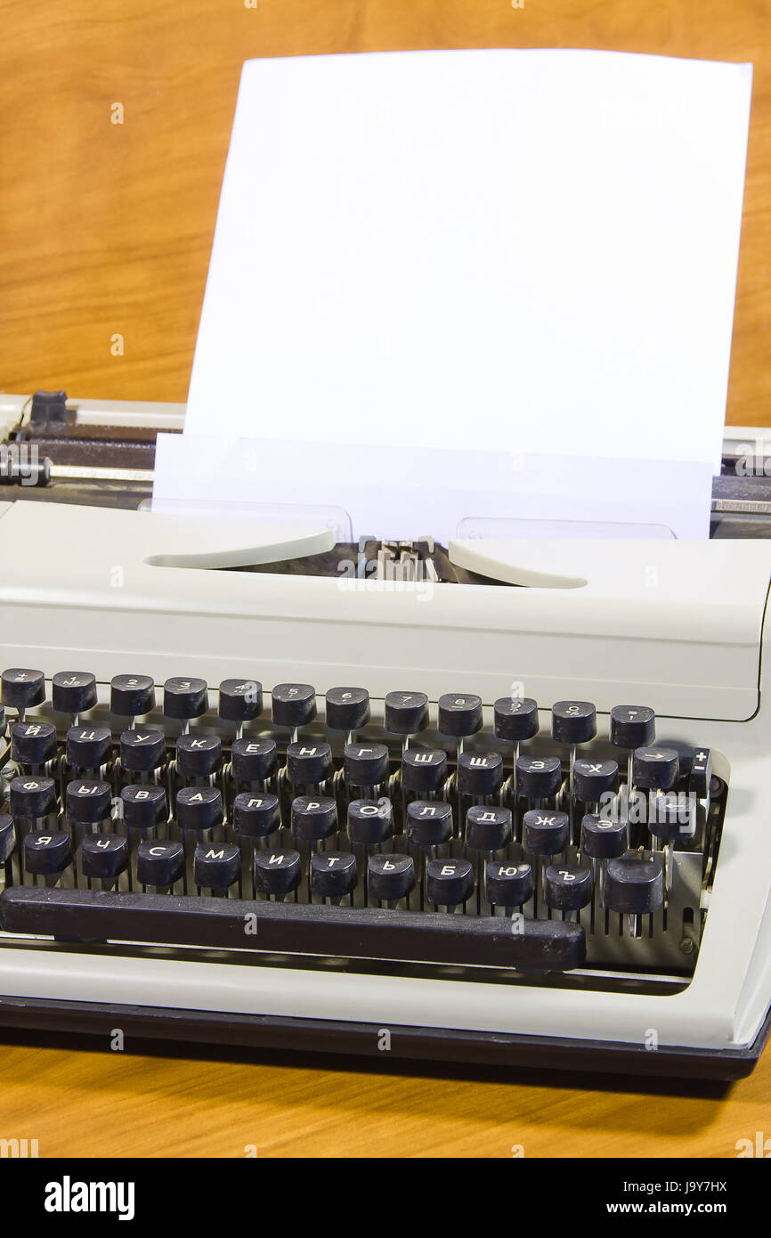 old typewriter and clean sheet of paper Stock Photo - Alamy