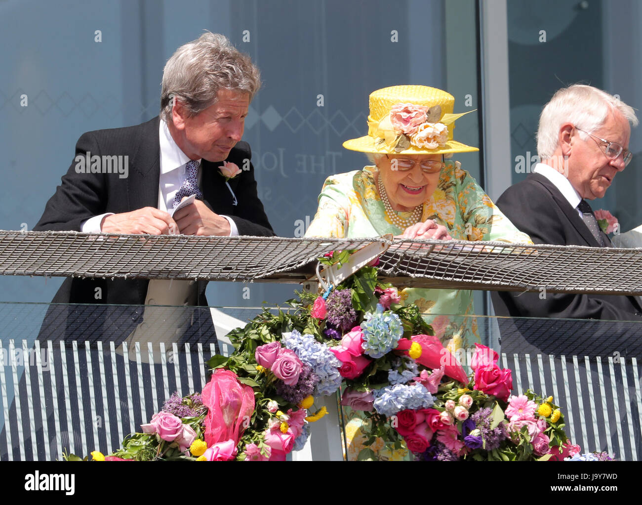 Queen Elizabeth II with her racing manager John Warren on Derby Day of ...