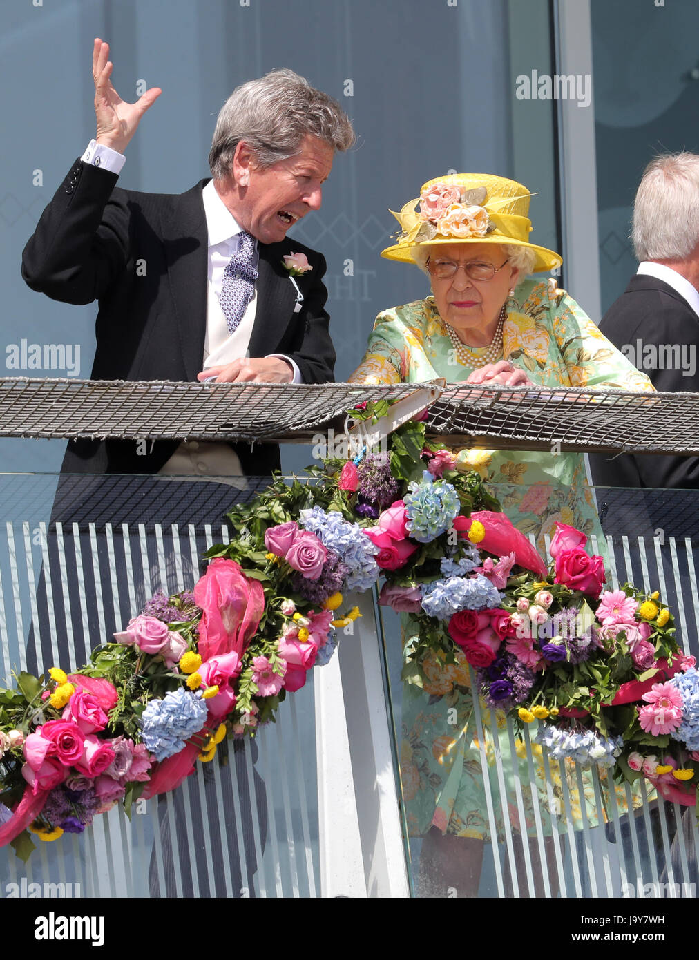 Queen Elizabeth II with her racing manager John Warren on Derby Day of ...