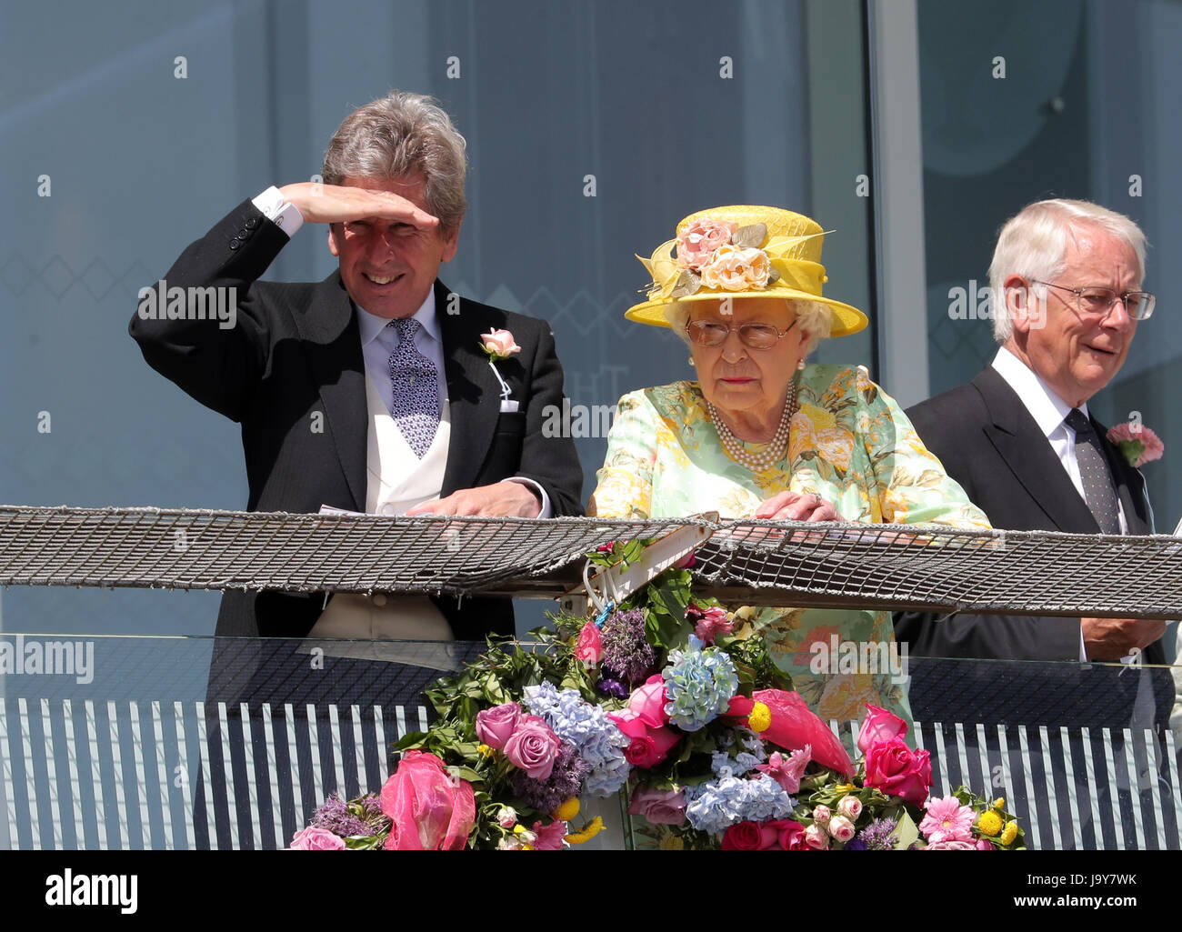 Queen Elizabeth II with her racing manager John Warren on Derby Day of ...