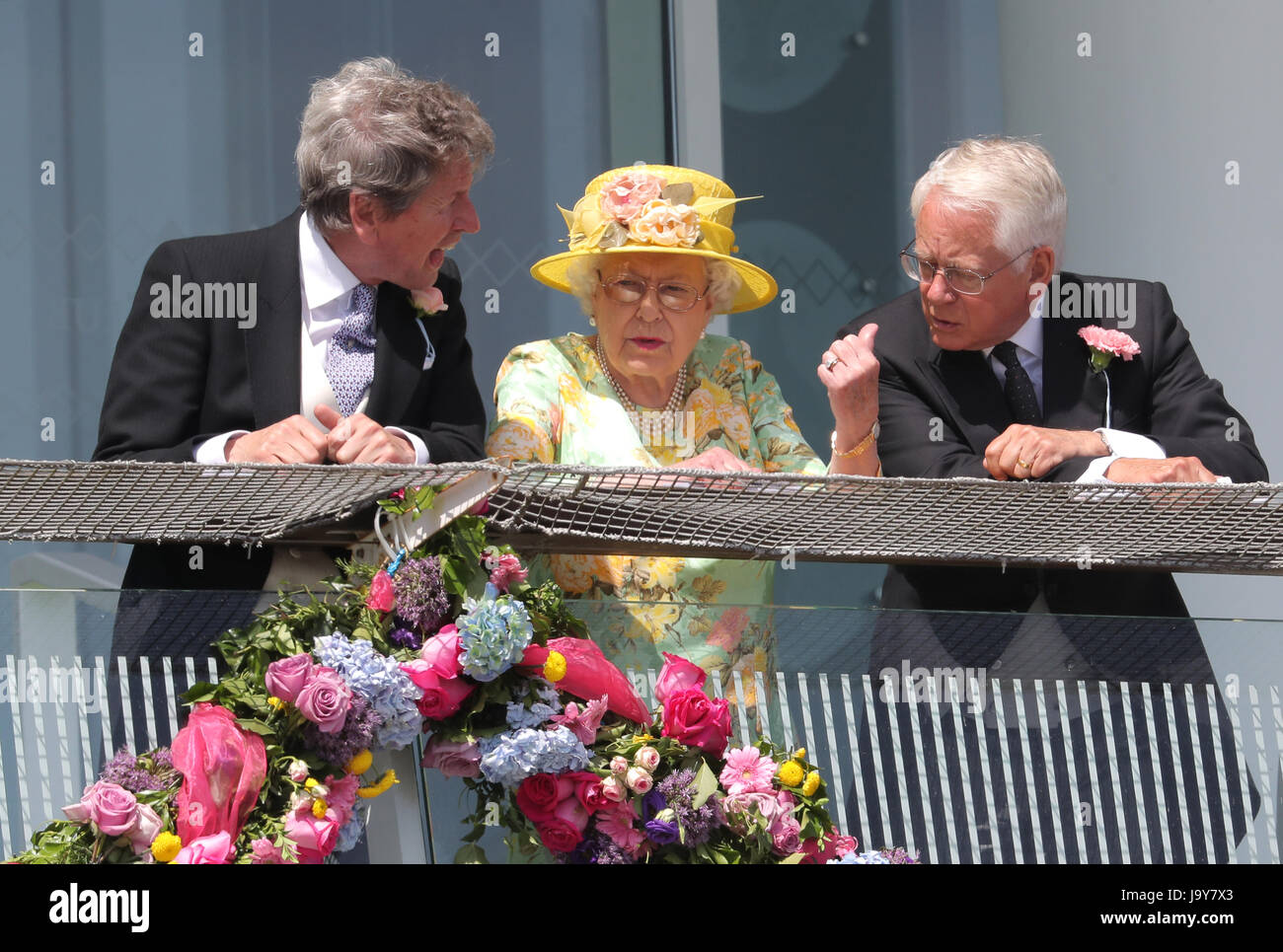 Queen Elizabeth II with her racing manager John Warren on Derby Day of ...