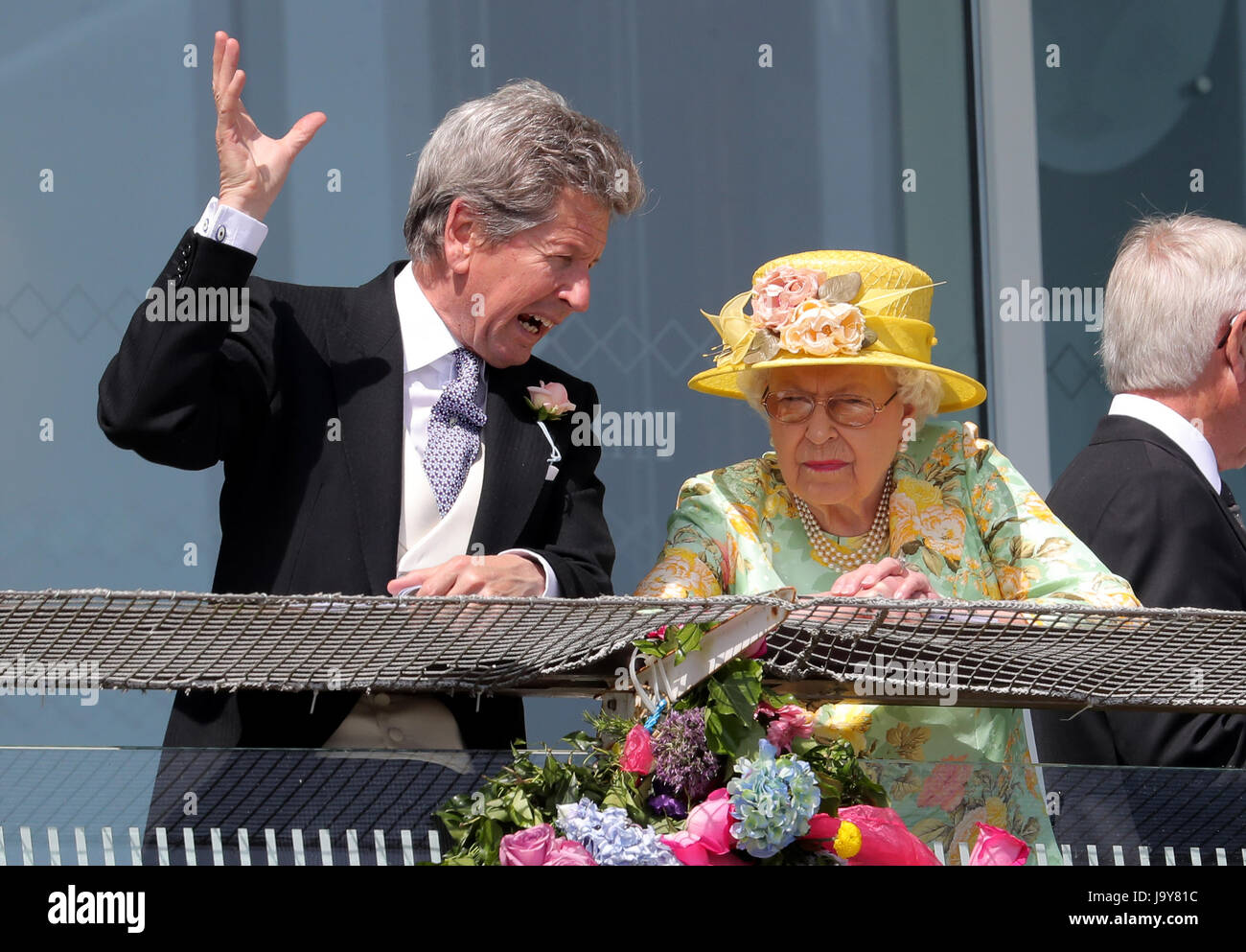 Queen Elizabeth II with her racing manager John Warren on Derby Day of ...