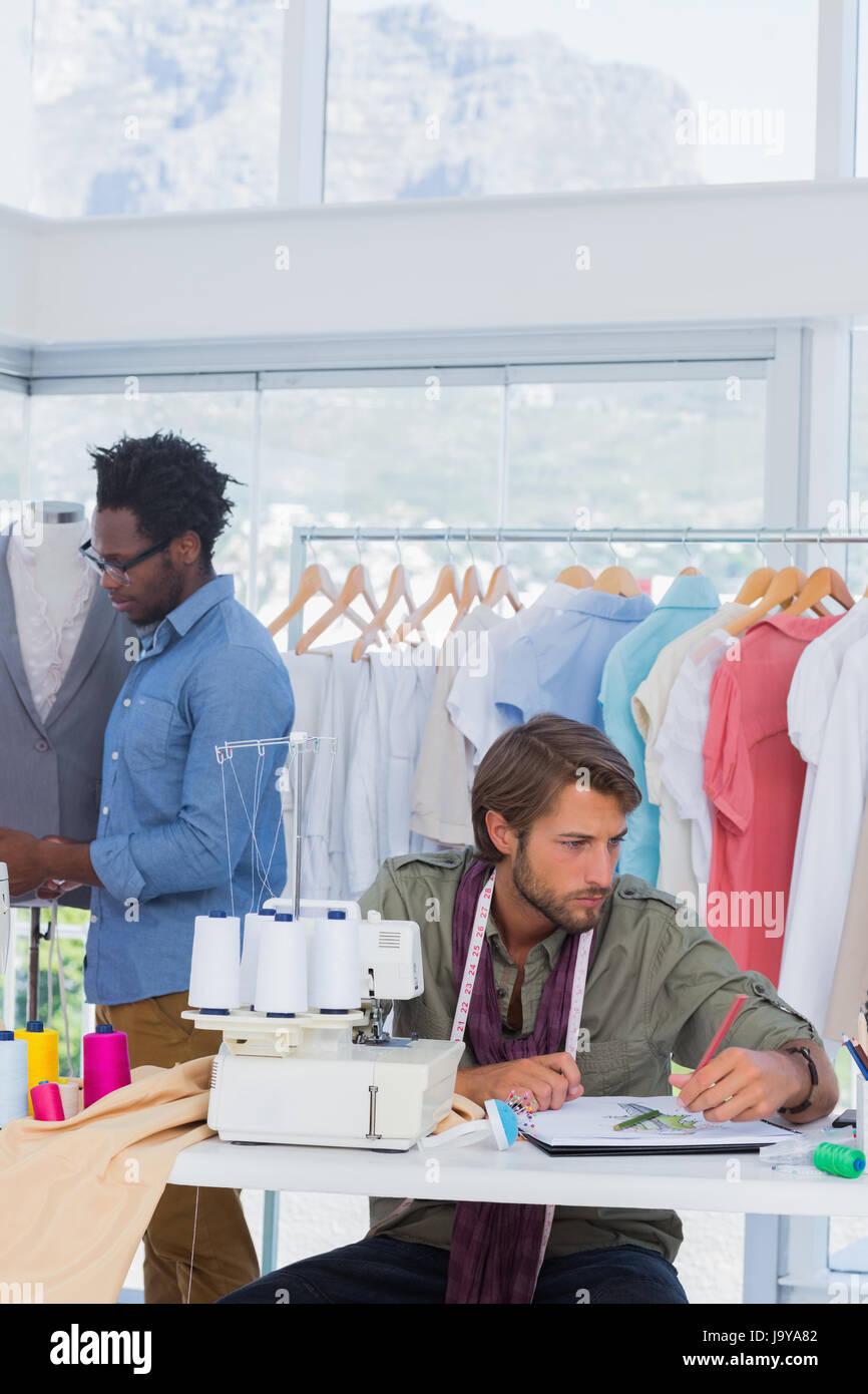 Group of fashion designers working in a creative office Stock Photo - Alamy