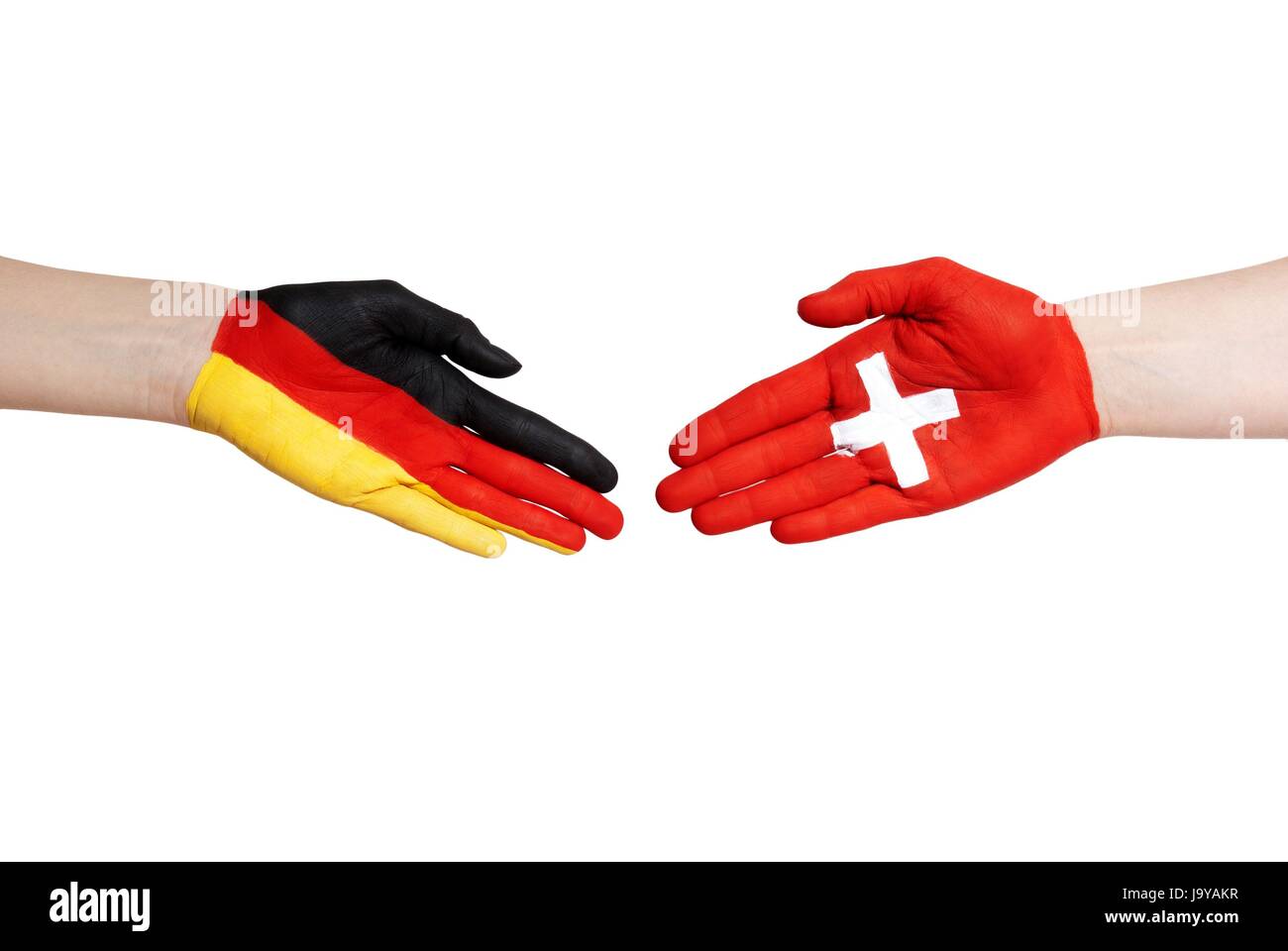 partnership between switzerland and germany symbolized with handshake ...