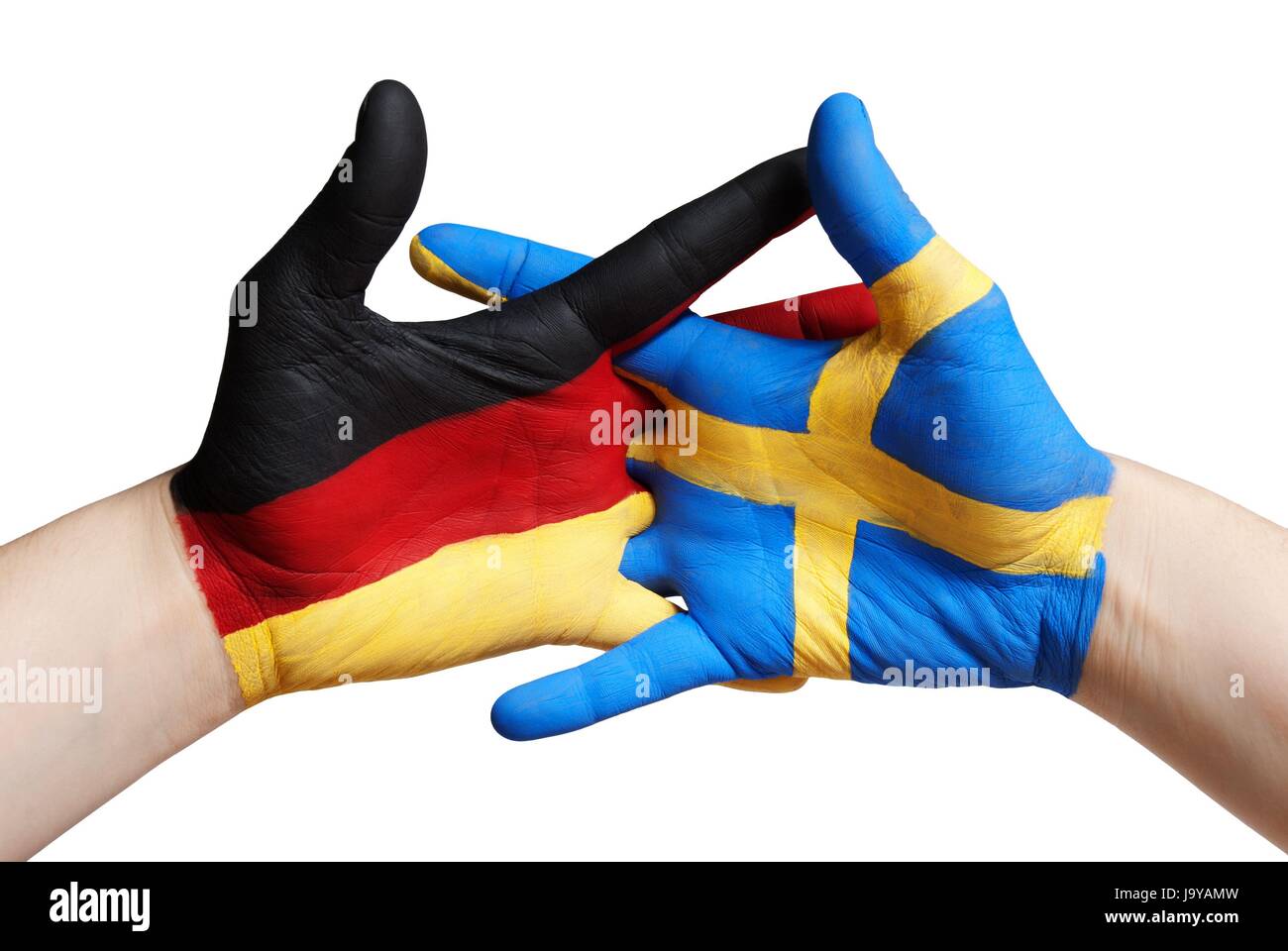a german and a swedish painted hand, isolated Stock Photo - Alamy