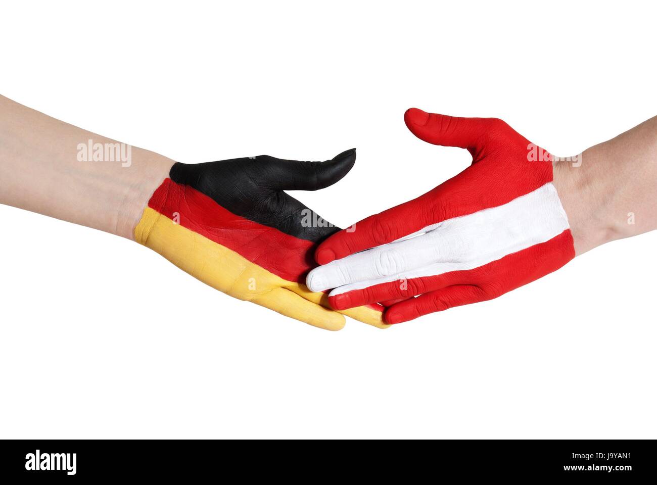 two shaking hands, painted in the colors of austria and germany Stock ...
