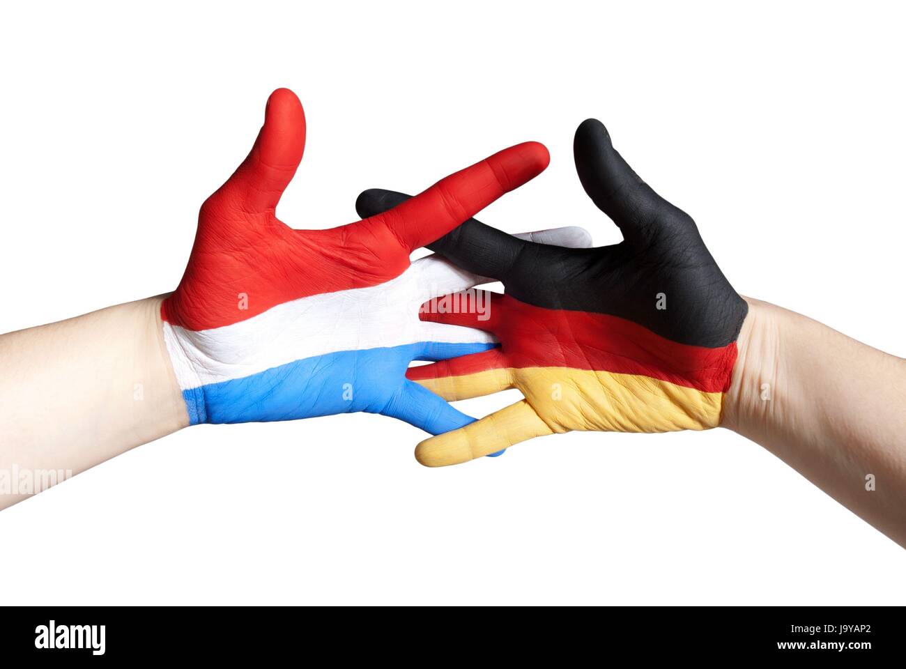a handshake which symbolizes partnership between germany and dutch ...