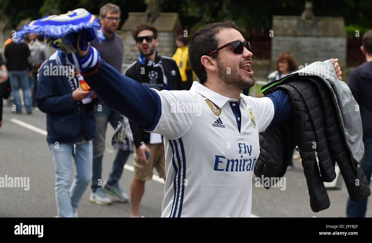 Fans line the street in Cardiff ahead of the UEFA Champions League ...