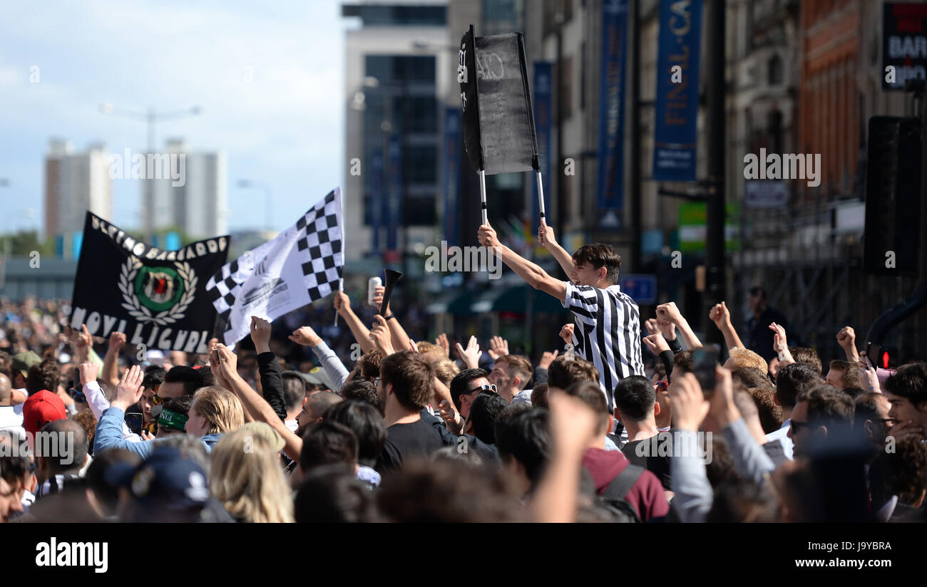 Fans line the streets ahead of the UEFA Champions League Final at the ...