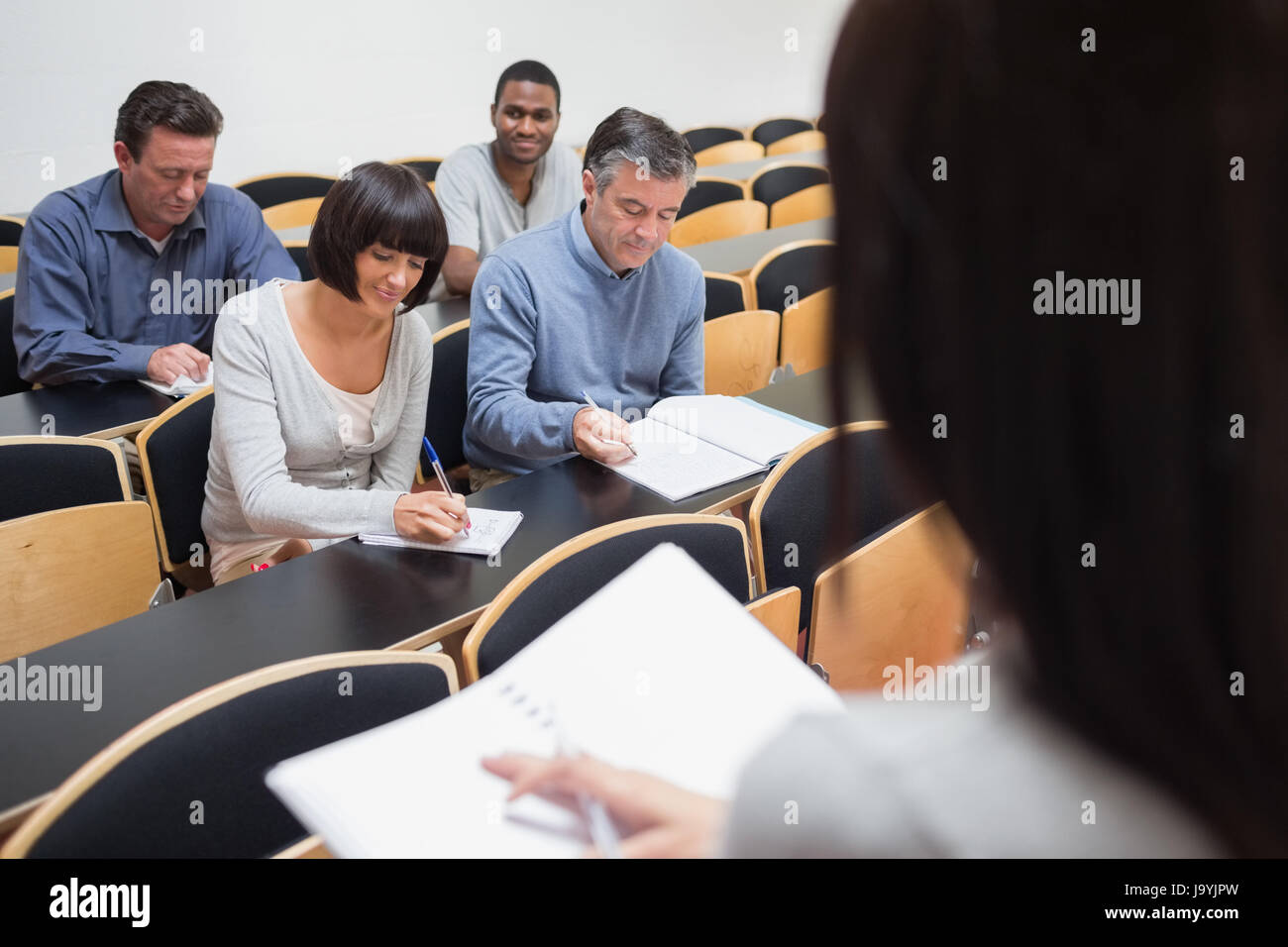 Lecturer taking class students hi-res stock photography and images - Alamy