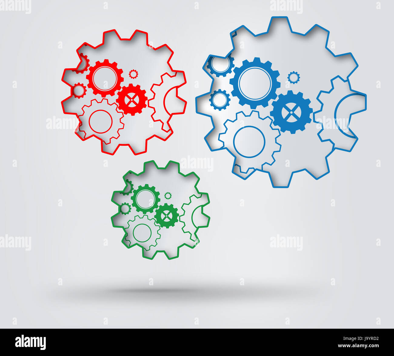 Colorful turning cogs against a white background Stock Photo - Alamy