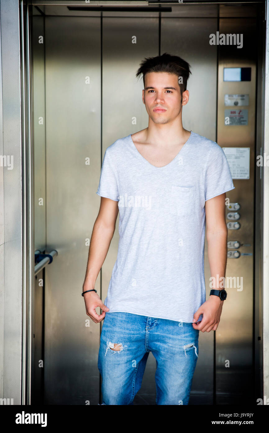 Man walking out elevator hi-res stock photography and images - Alamy