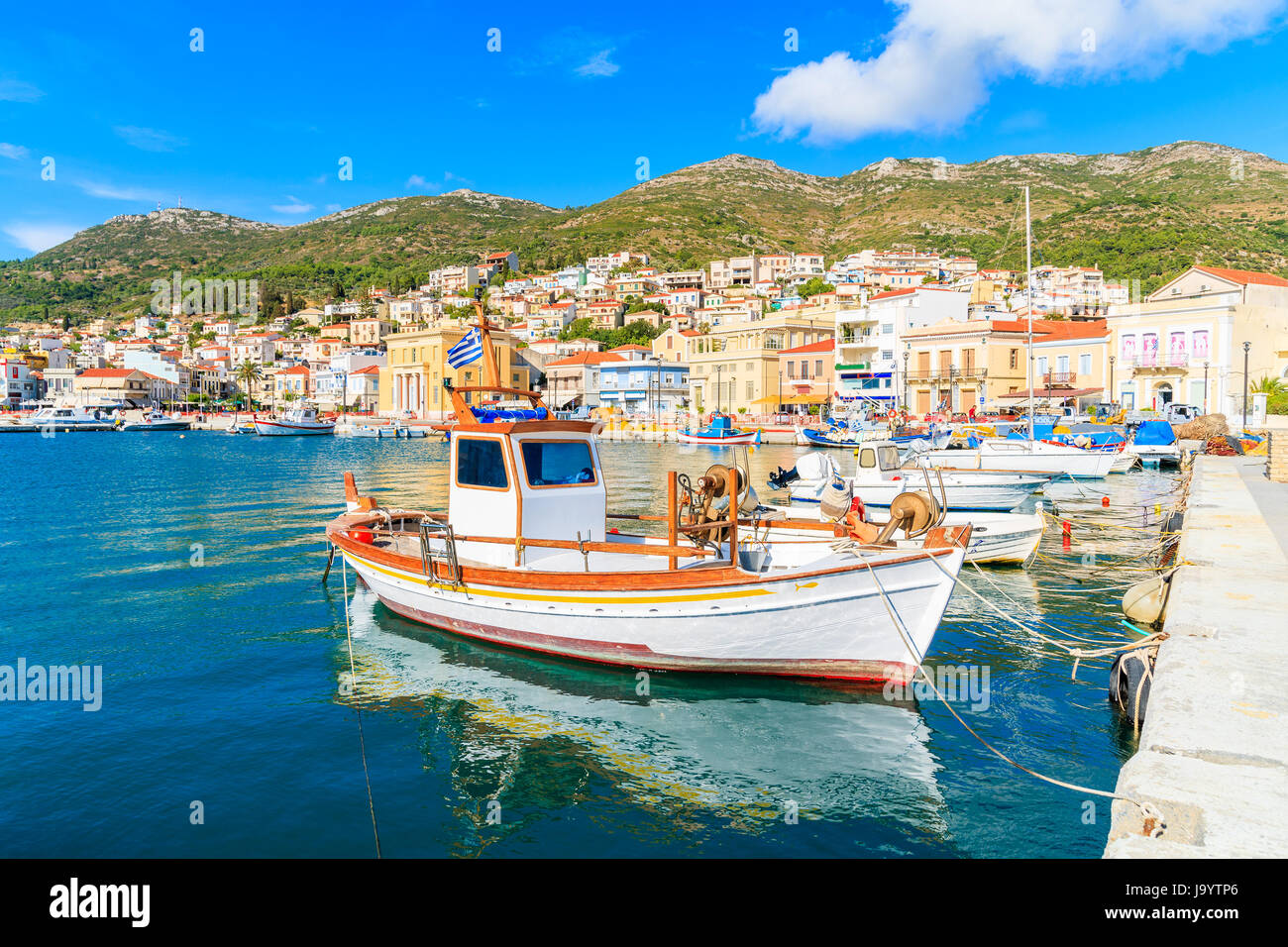 Typical fishing boat in Vathy port on beautiful summer day, Samos ...