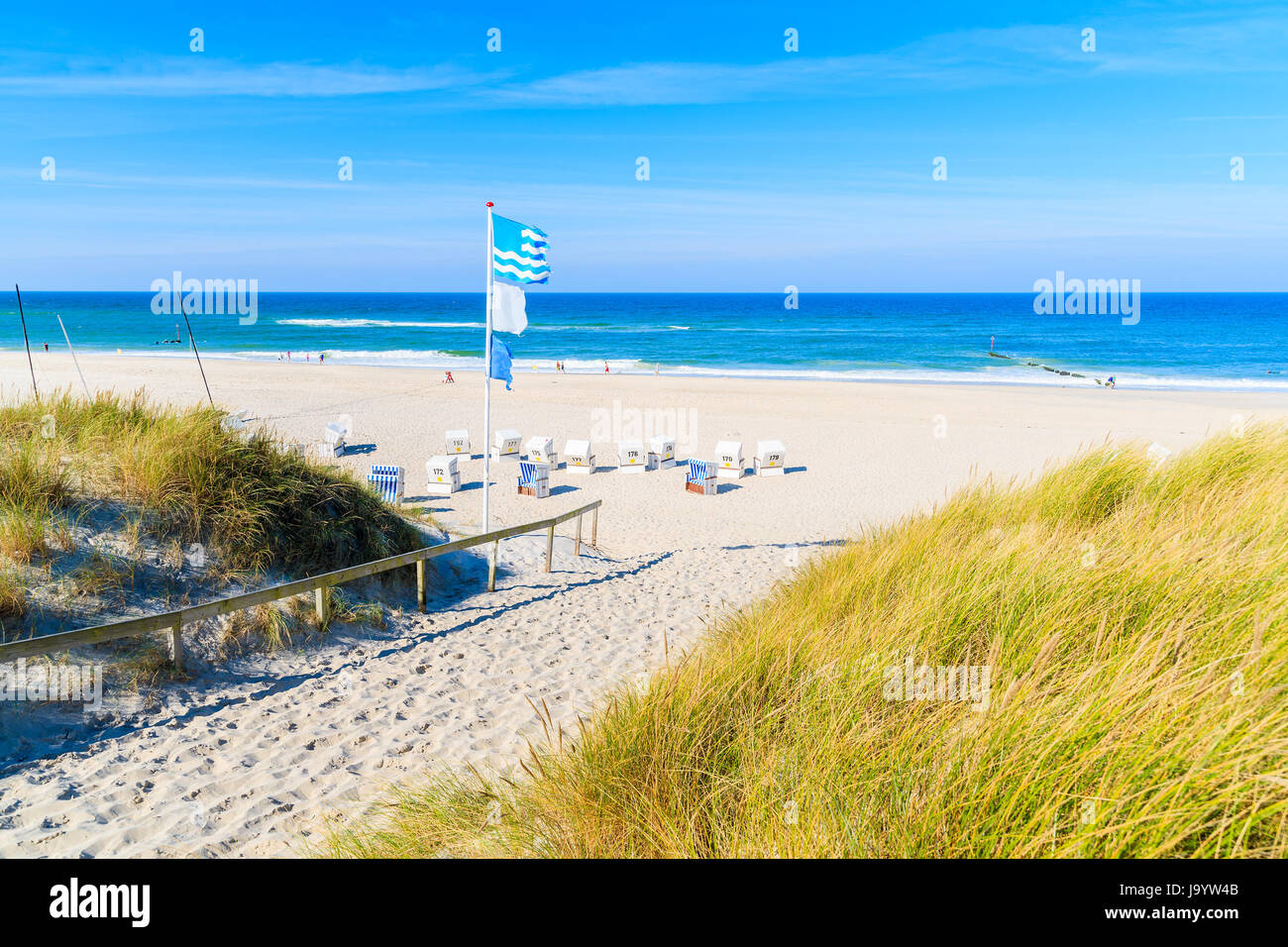Entrance among grass sand dunes to Kampen beach, Sylt island, North Sea ...