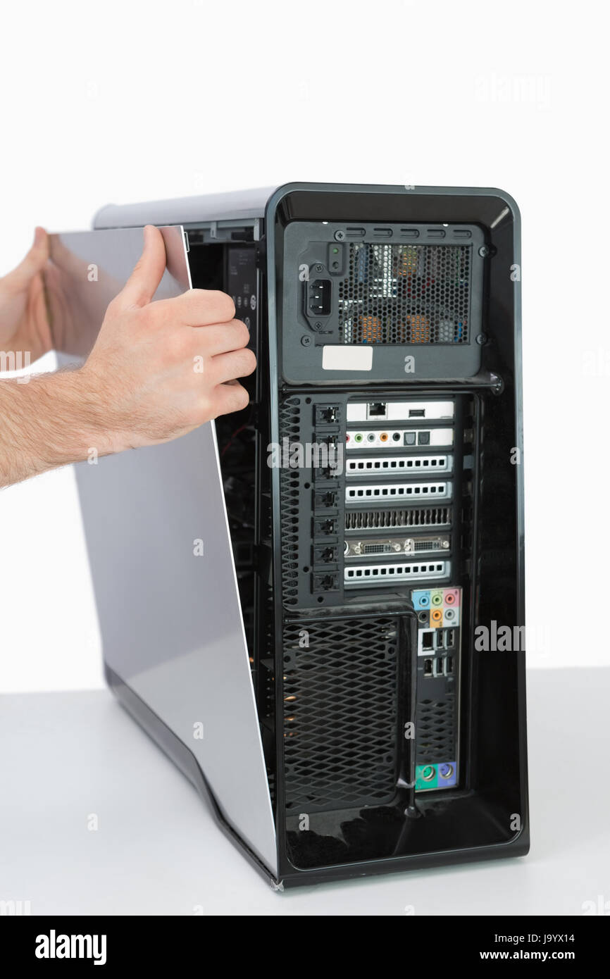 Closeup of hands casing cpu over white background Stock Photo - Alamy
