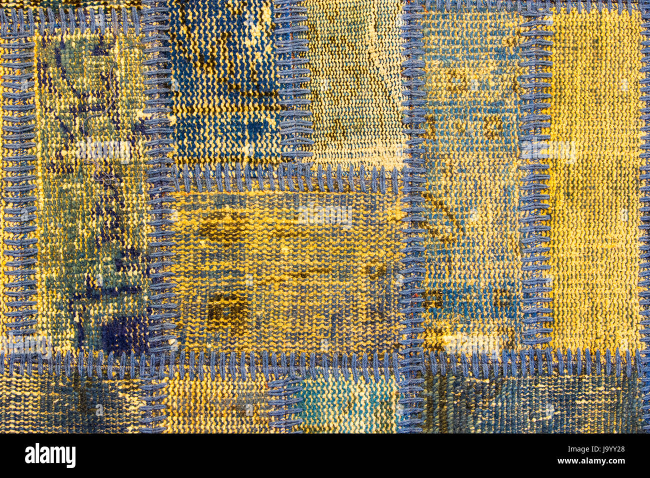 Texture of a piece of old carpet to sew thick threads Stock Photo - Alamy