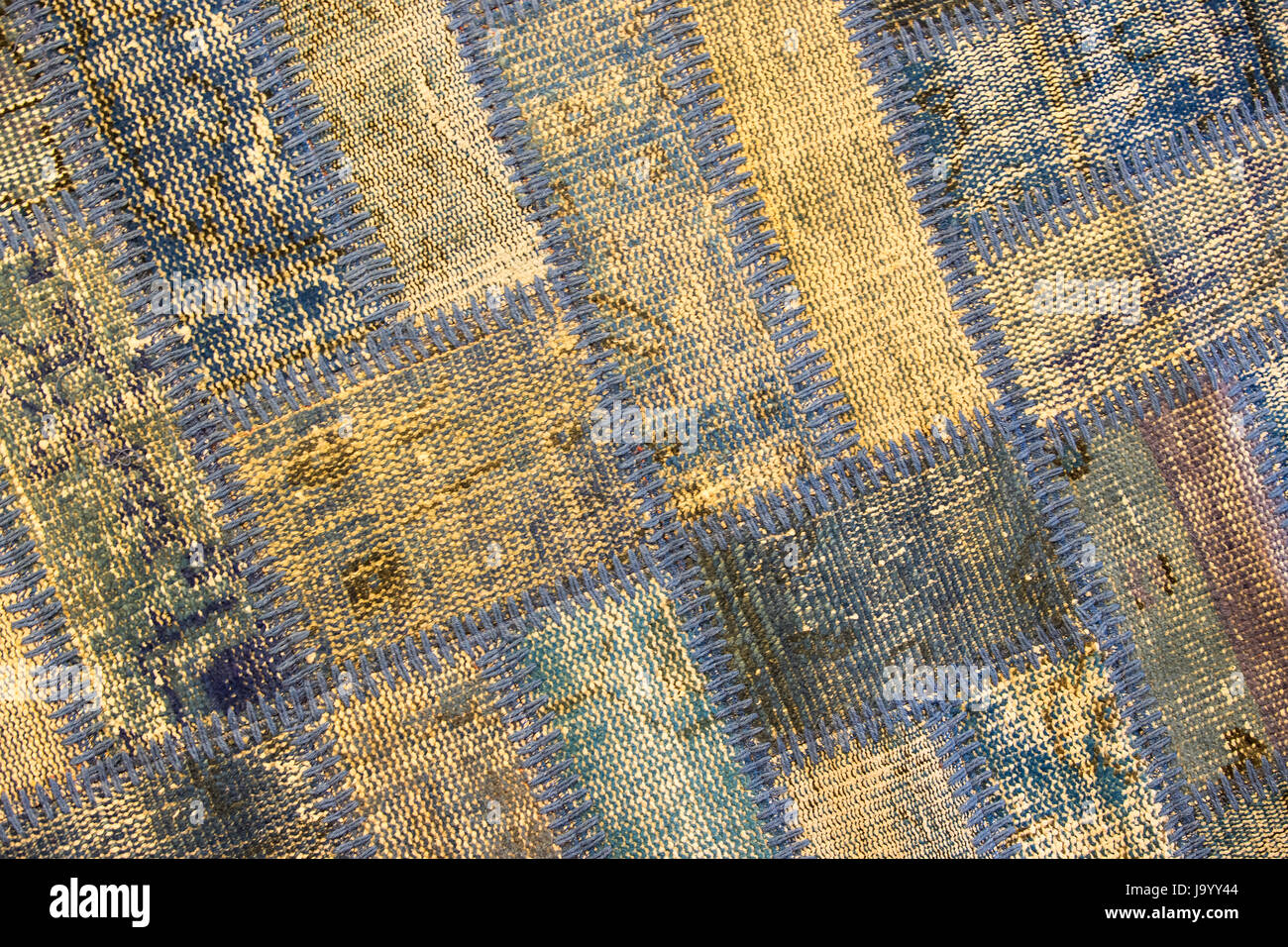 Texture of a piece of old carpet to sew thick threads Stock Photo - Alamy