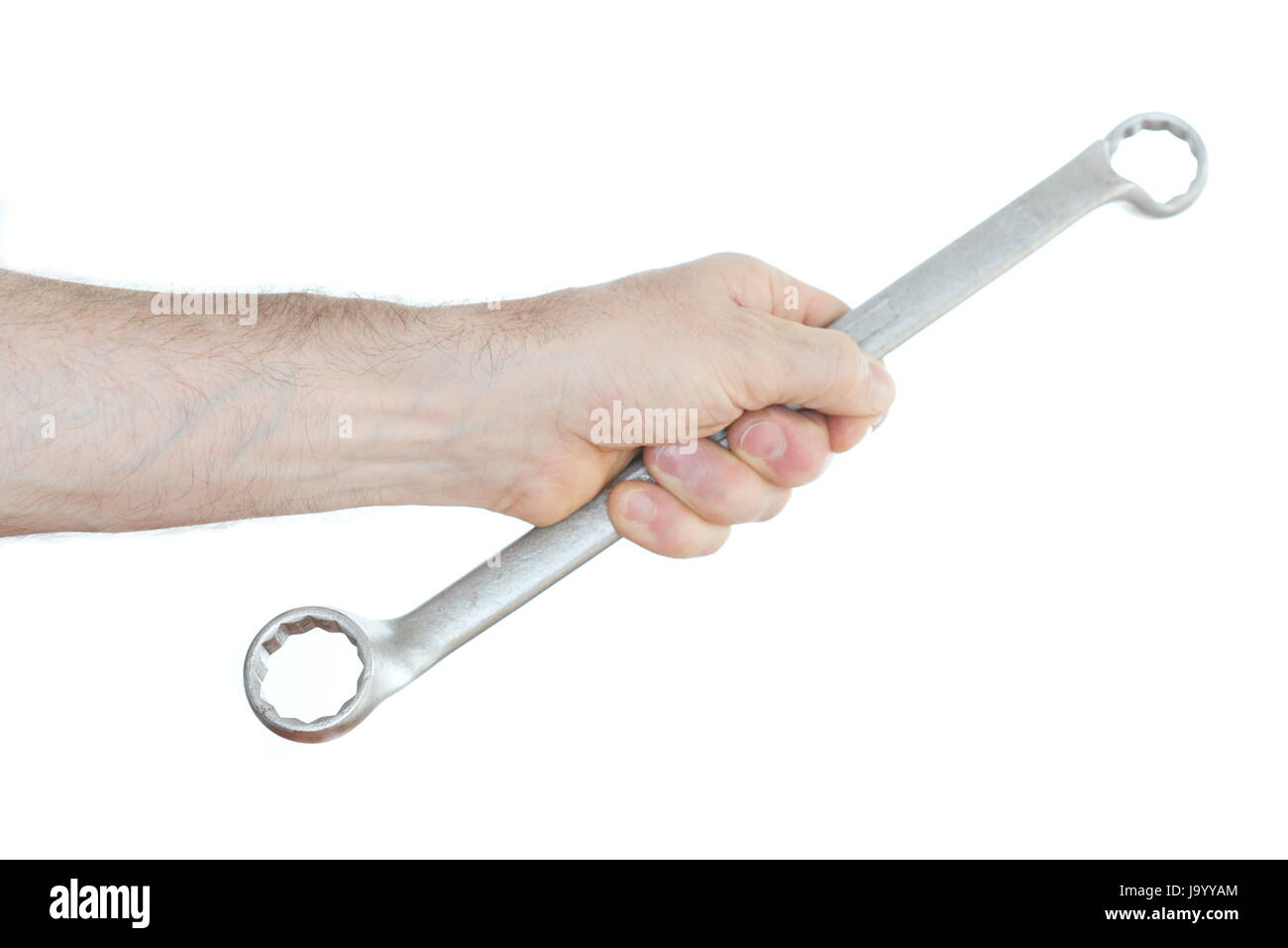 hand and wrench Stock Photo - Alamy