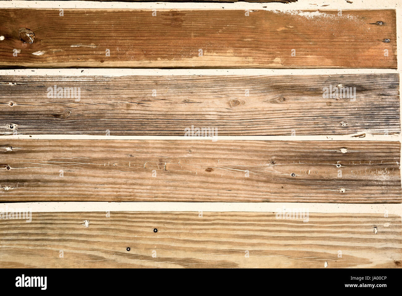 Brown wooden planks in the sand. Wood texture Stock Photo - Alamy