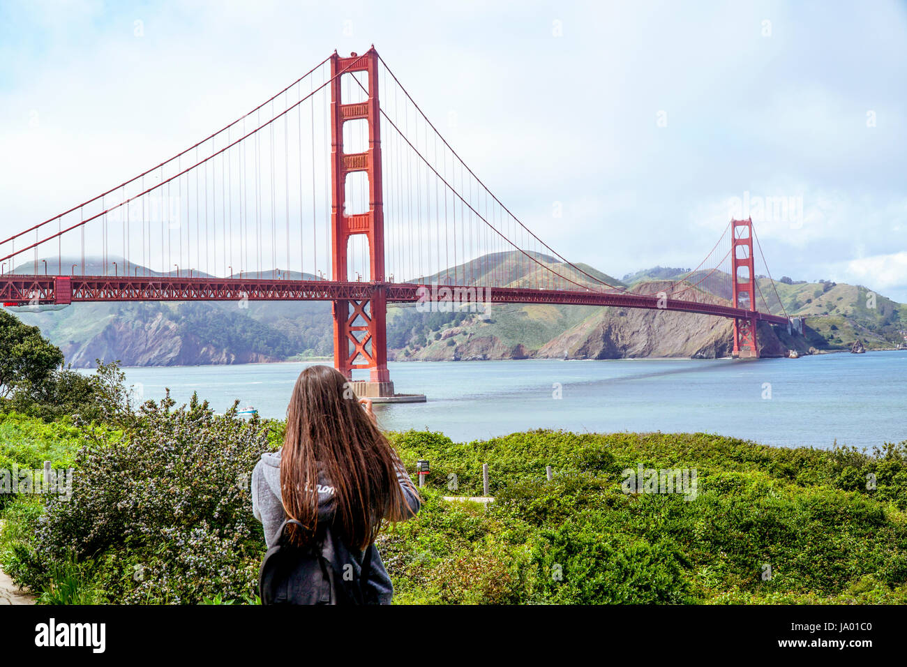 Girls takes a photo of Golden Gate Bridge in San Francisco - SAN ...