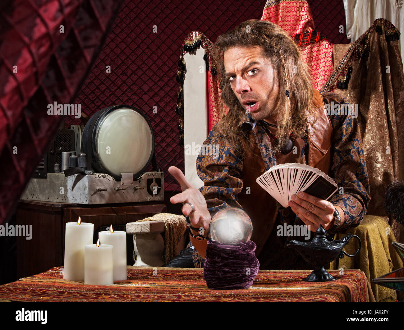Handsome male fortune teller hi-res stock photography and images - Alamy